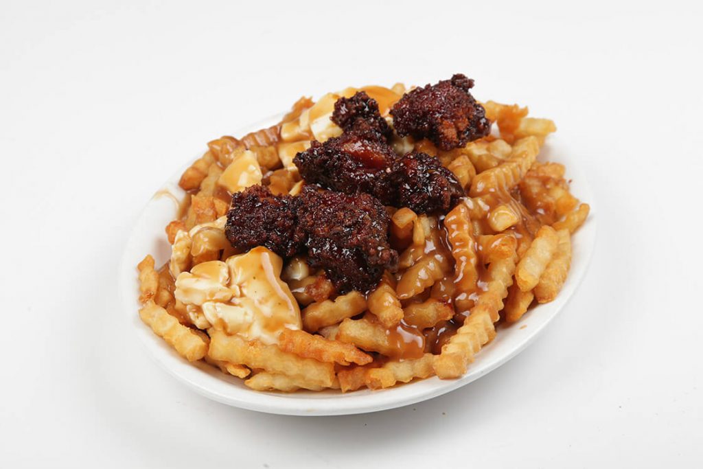 Poutine général tao - Resto-Bar Le Cinquante-cinq